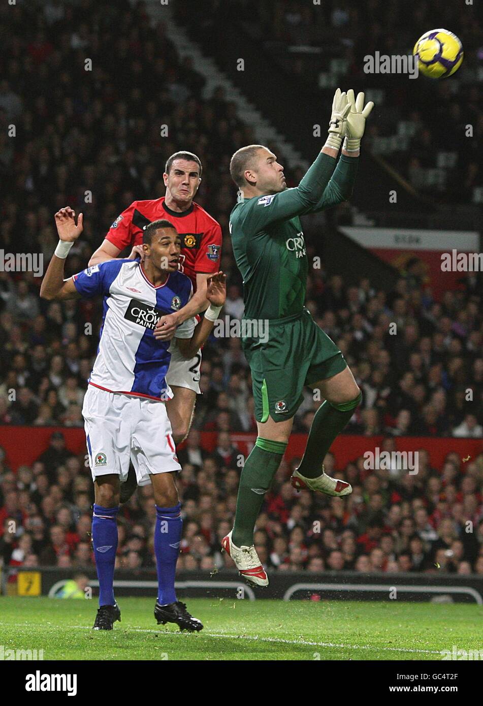 Blackburn Rovers goalkeeper Paul Robinson (right) makes a save as ...