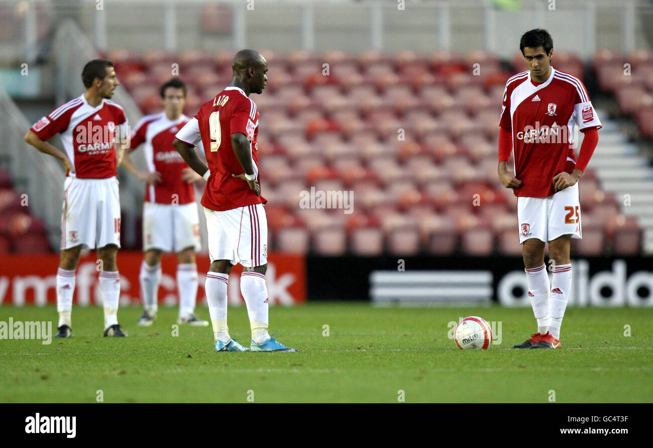 Middlesbrough's Leroy Lita and Rhys Williams (right) stand dejected as ...