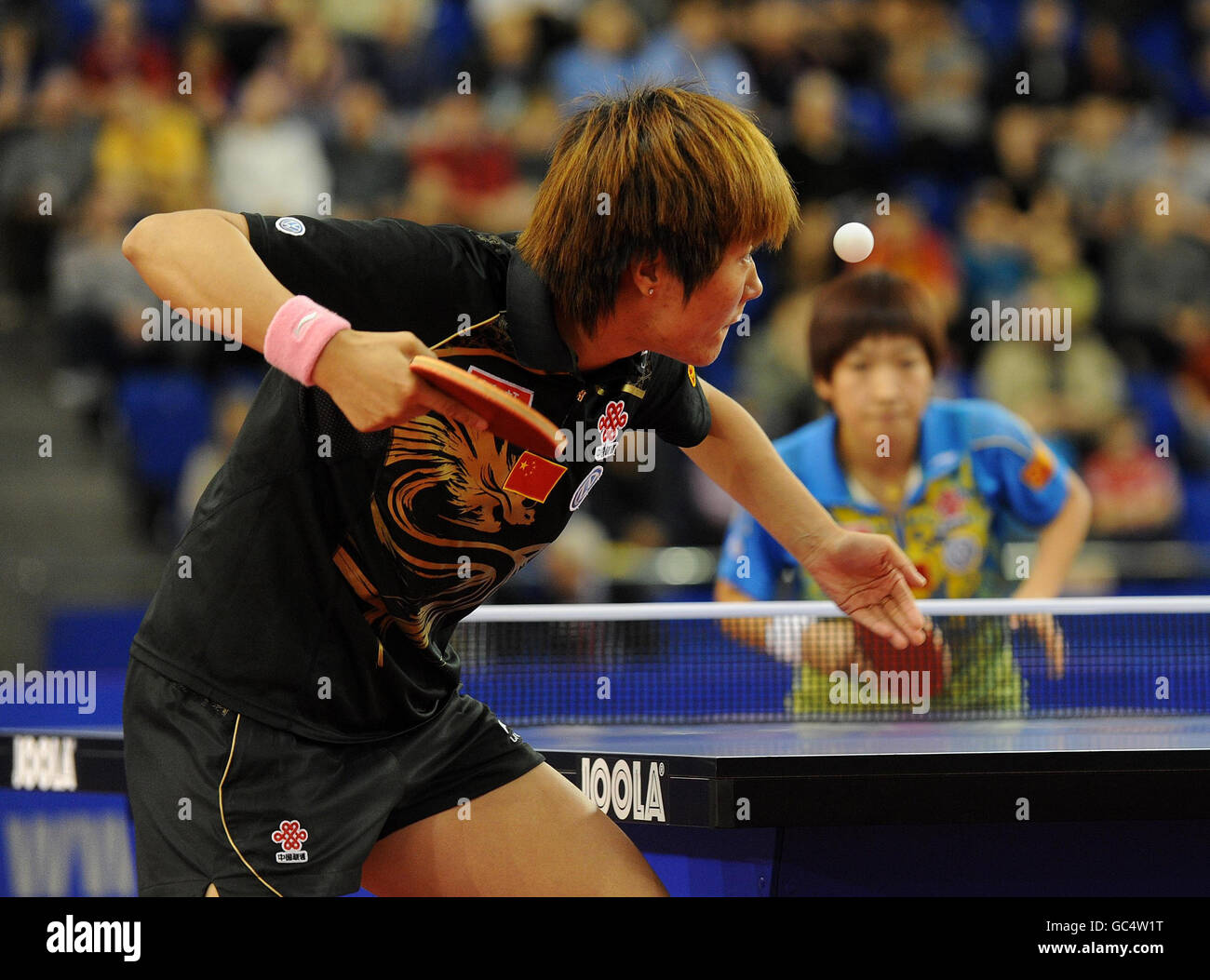 China's Guo Yan serves to China's Liu Shiwen (right) in the Women's ...