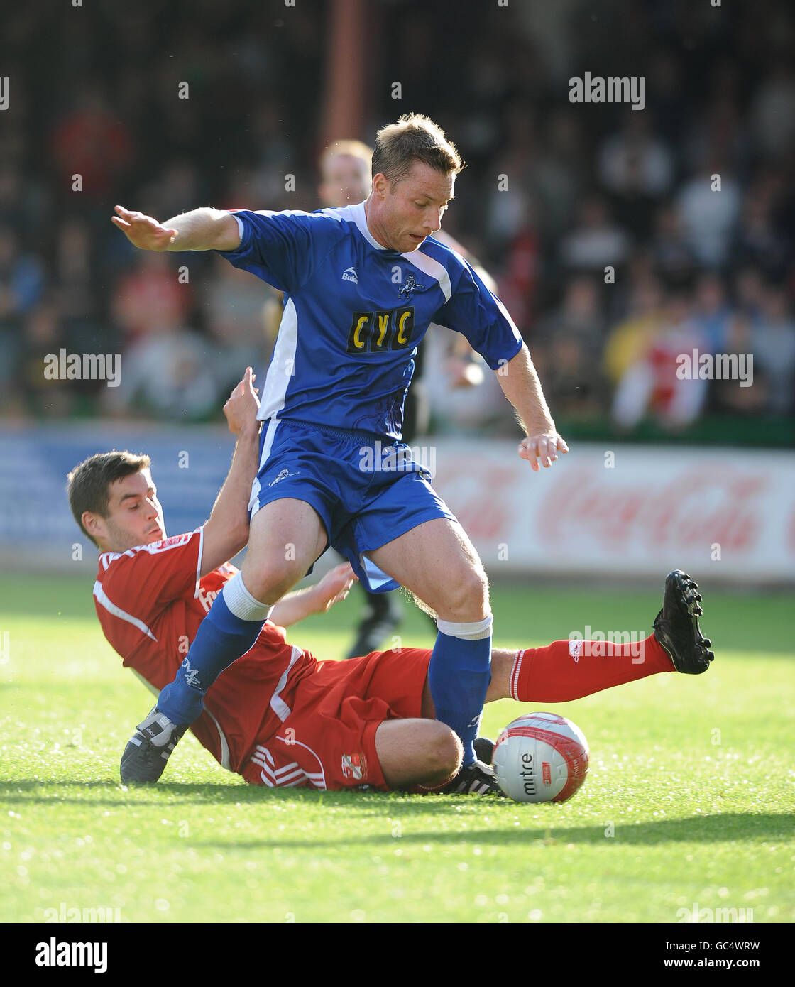 Swindon Town's Michael Timlin tackles and Millwall's Neil Harris Stock ...