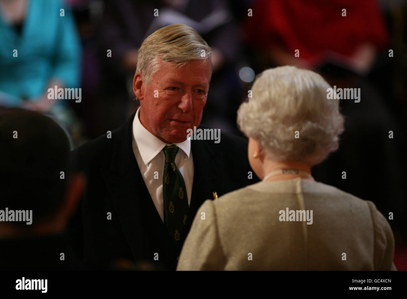 Mr. Geoffrey Farr from Luton is made an MBE by The Queen at Buckingham ...