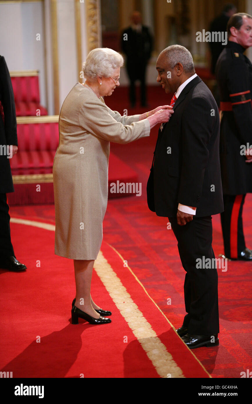 Mr. Russell Profitt from London is made an MBE by The Queen at ...