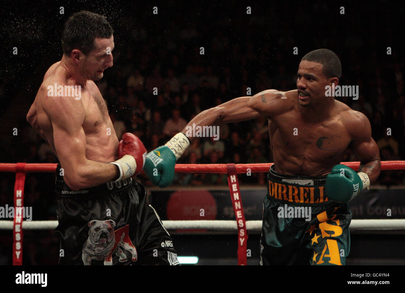 Great Britain's Carl Froch (left) takes big right on the chin on his ...