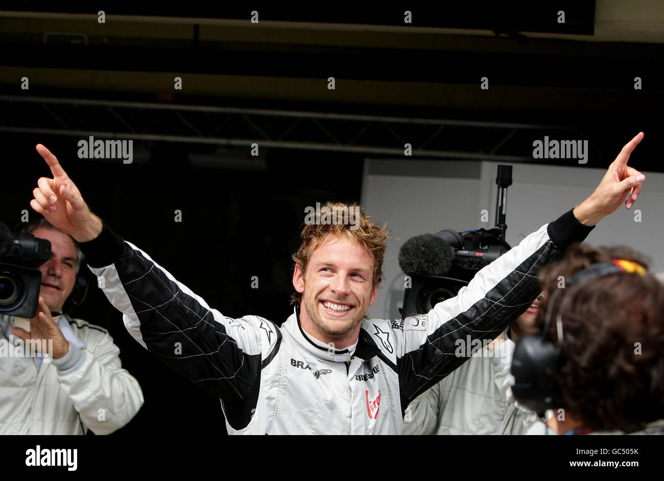 Brawn GP's Jenson Button celebrates after winning the World ...