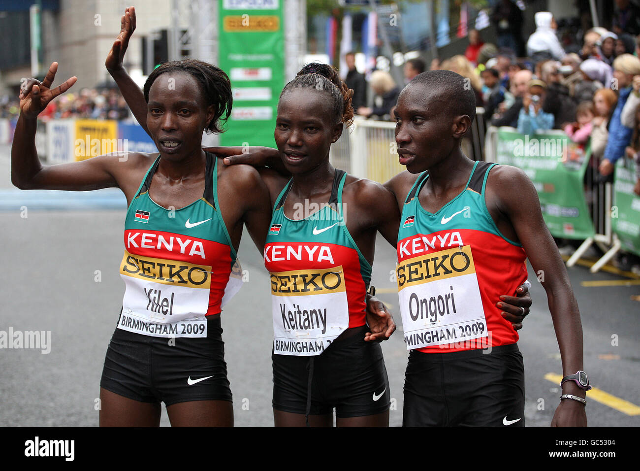 Mary Jepkosgei Keitany (centre) from Kenya celebrates her win with 2nd ...