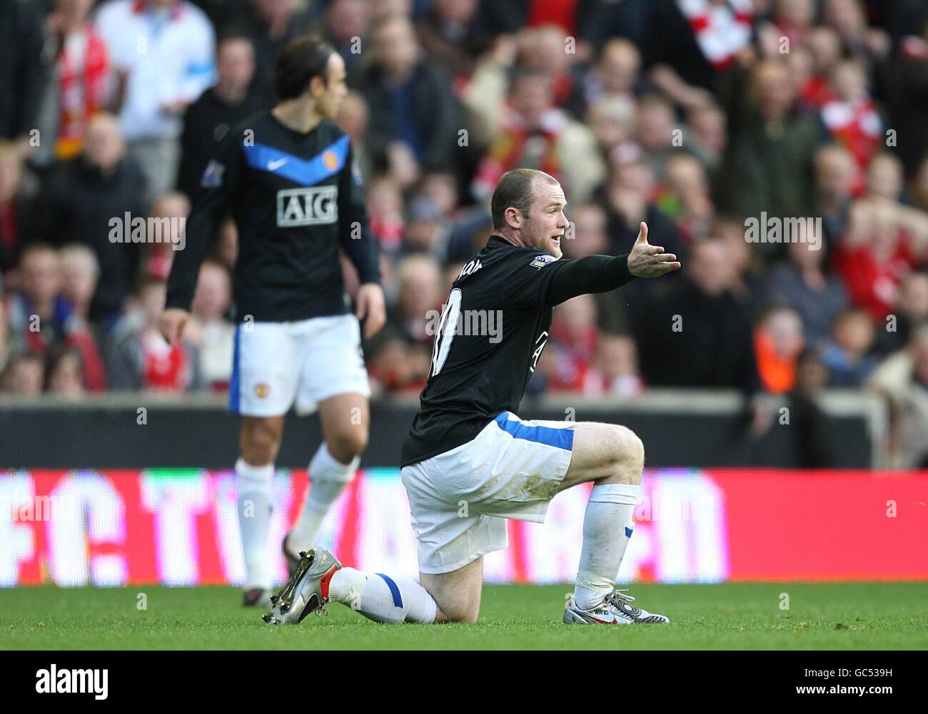 Manchester United's Wayne Rooney shows his frustration at Anfield Stock ...