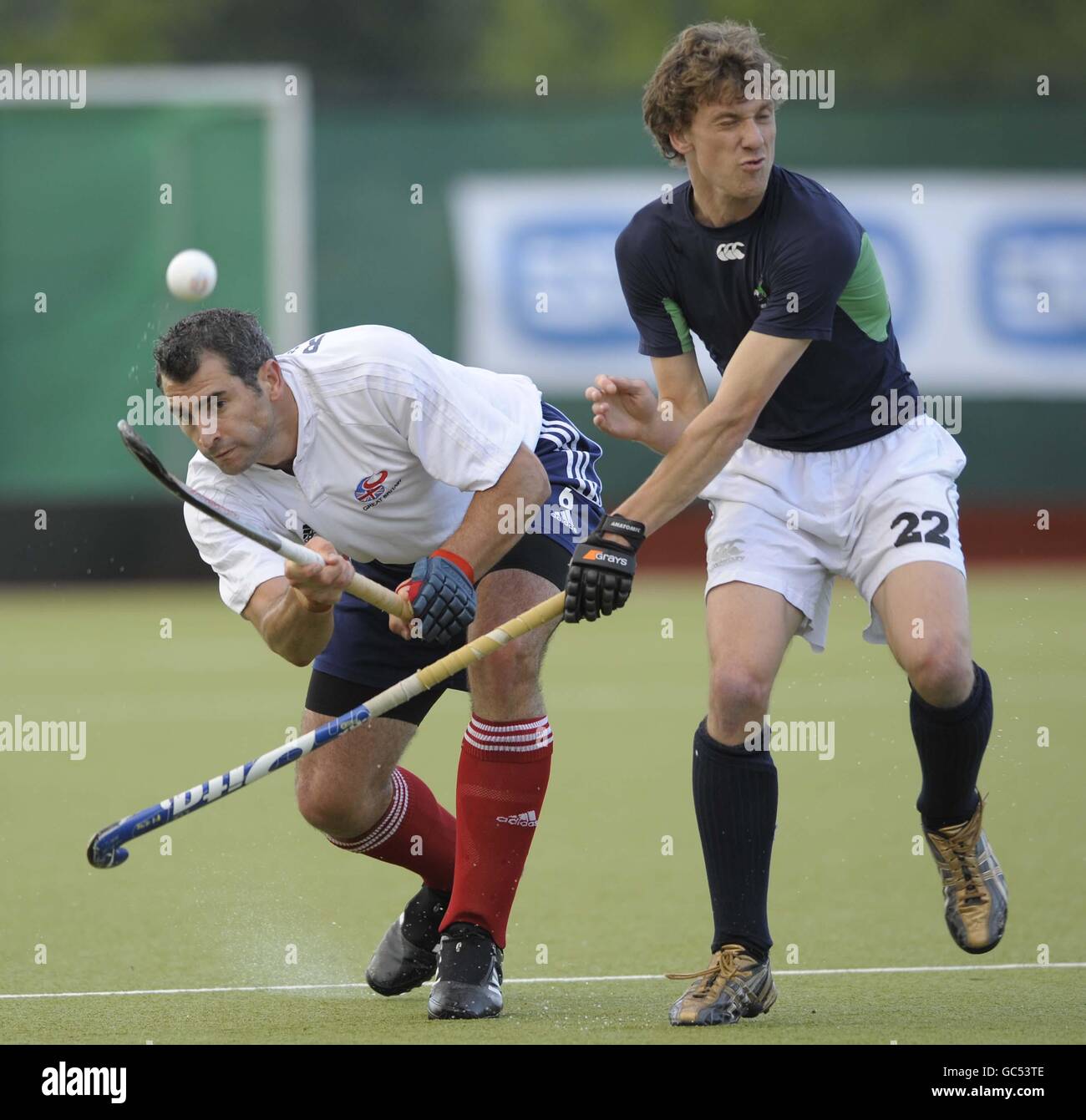 Great Britain's Richard Mantell (left) clears his lines from Ireland's ...