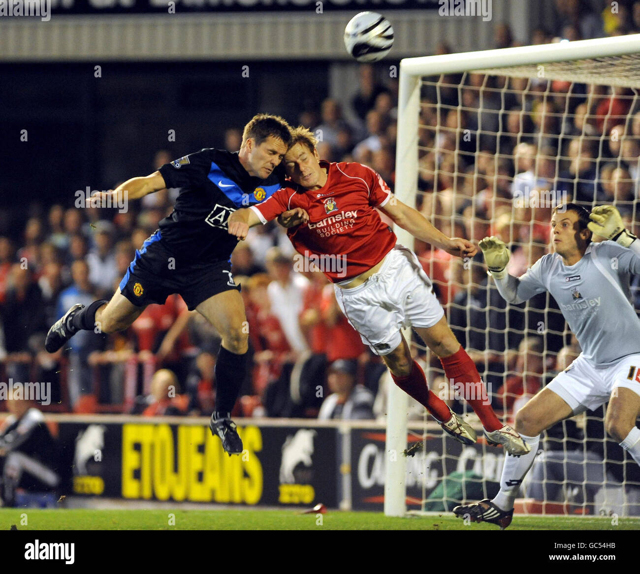 Manchester united player tackle hi-res stock photography and images - Alamy