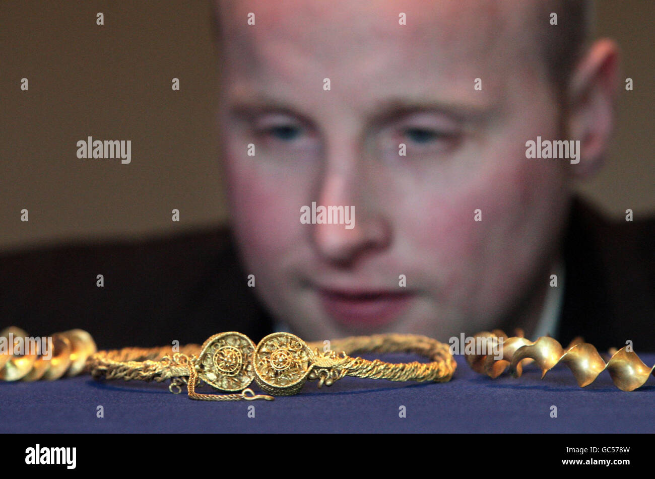 Metal detecting enthusiast David Booth, looks at four gold Iron Age ...