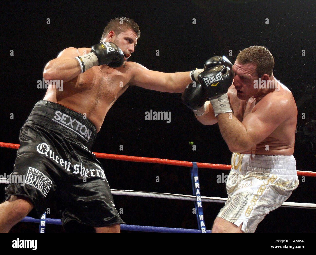 England's Sam Sexton (left) on top against Ireland's Martin Rogan ...