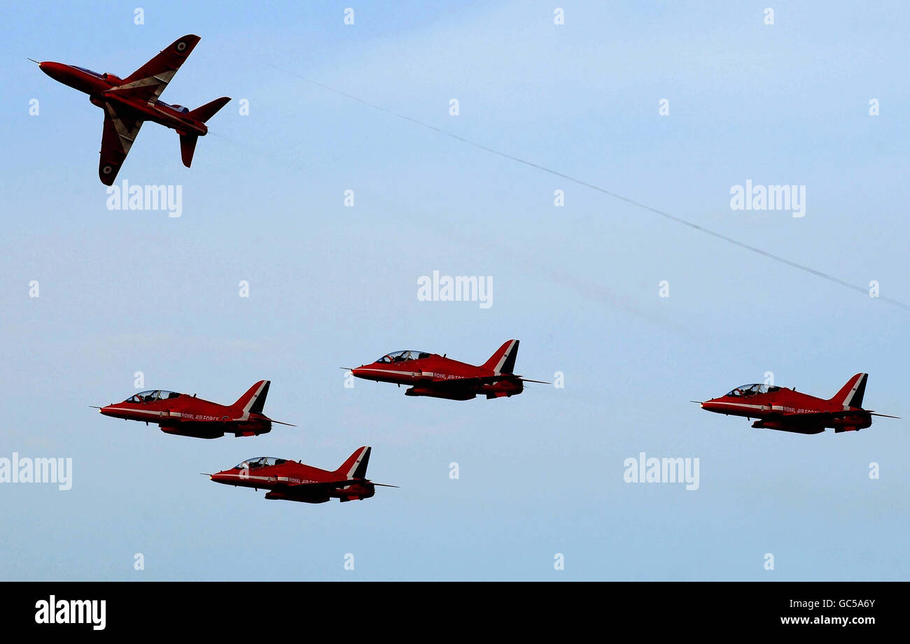The Red Arrows do a flypast over RAF Scampton, Lincolnshire, as Flight ...