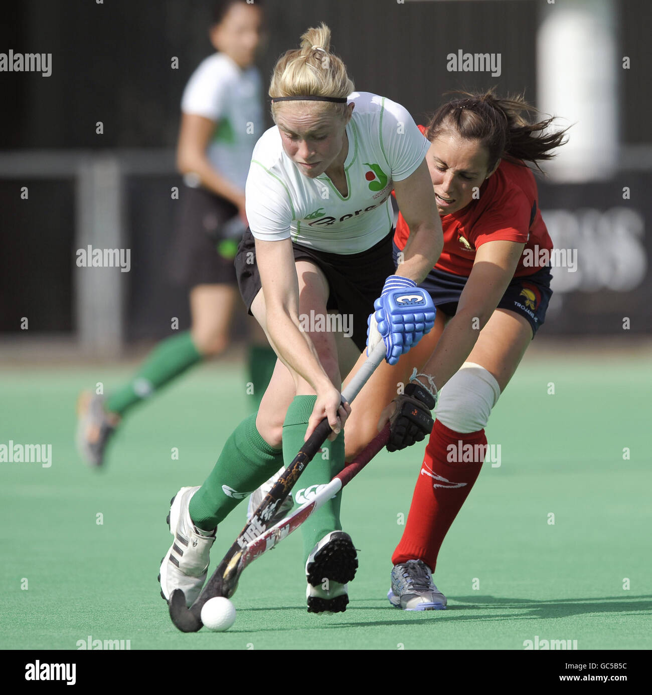 Canterbury's Natalie Seymour (left) is challenged by Trojan's Emma ...