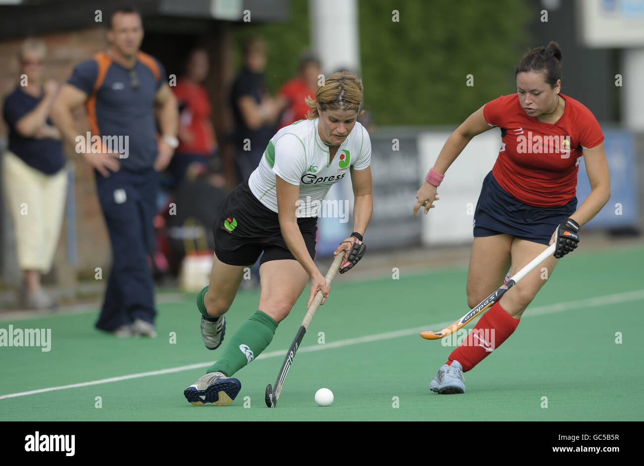 Canterbury's Jen Wilson left) battles with Trojan's Jo Bryant (right ...