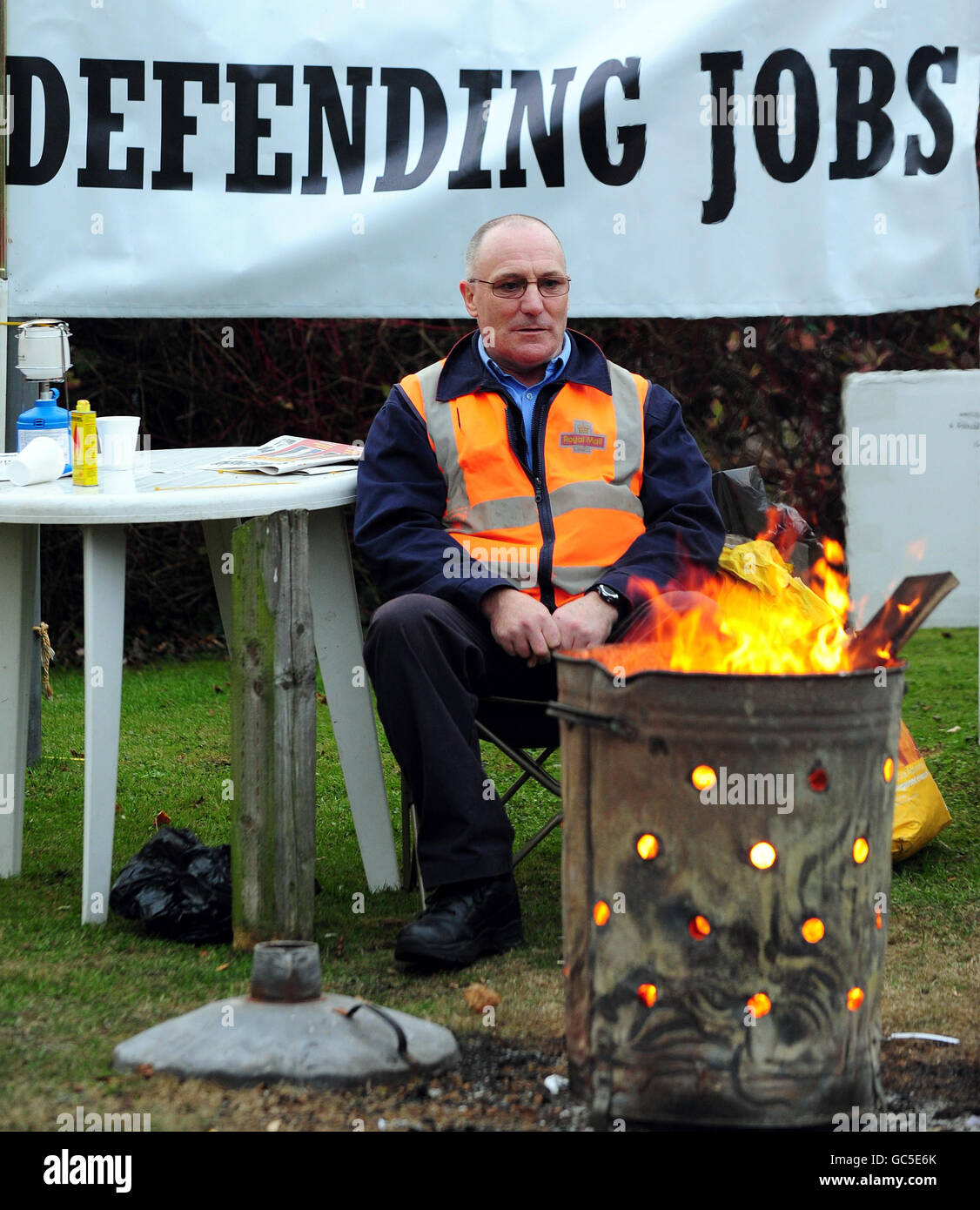 A striking postal worker outside Beeston Mail Centre, Nottingham, as ...