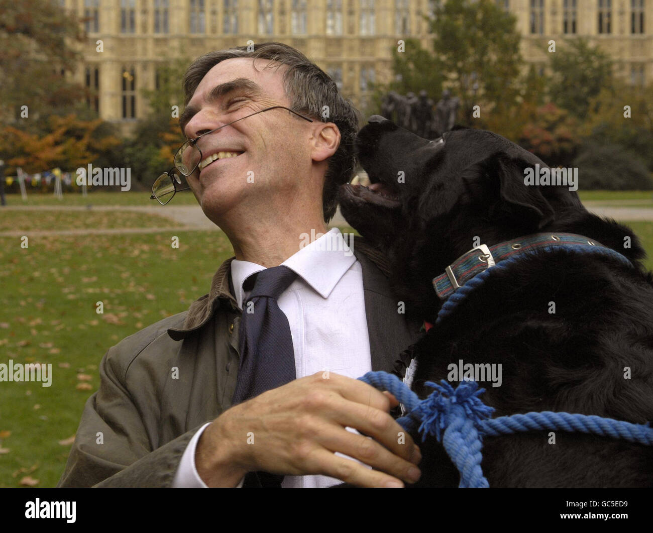 Buster, Conservative MP Andrew Murrison's dog licks his face following ...
