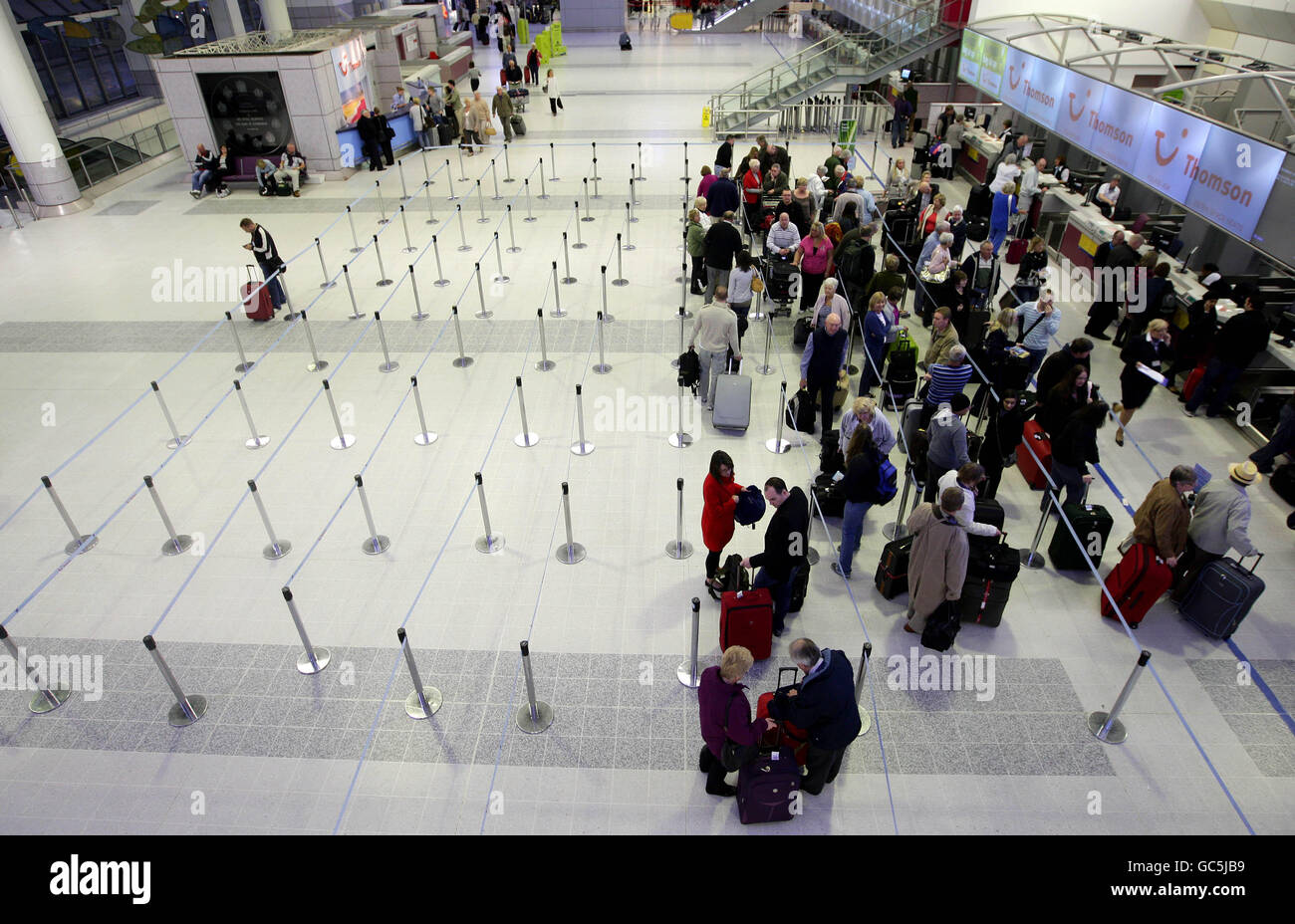 General view of Manchester Airport, Passengers checking in at Terminal ...