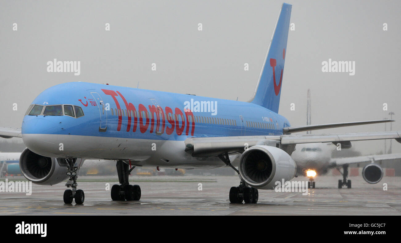 Two planes queue ahead of take off at manchester airport hi-res stock ...