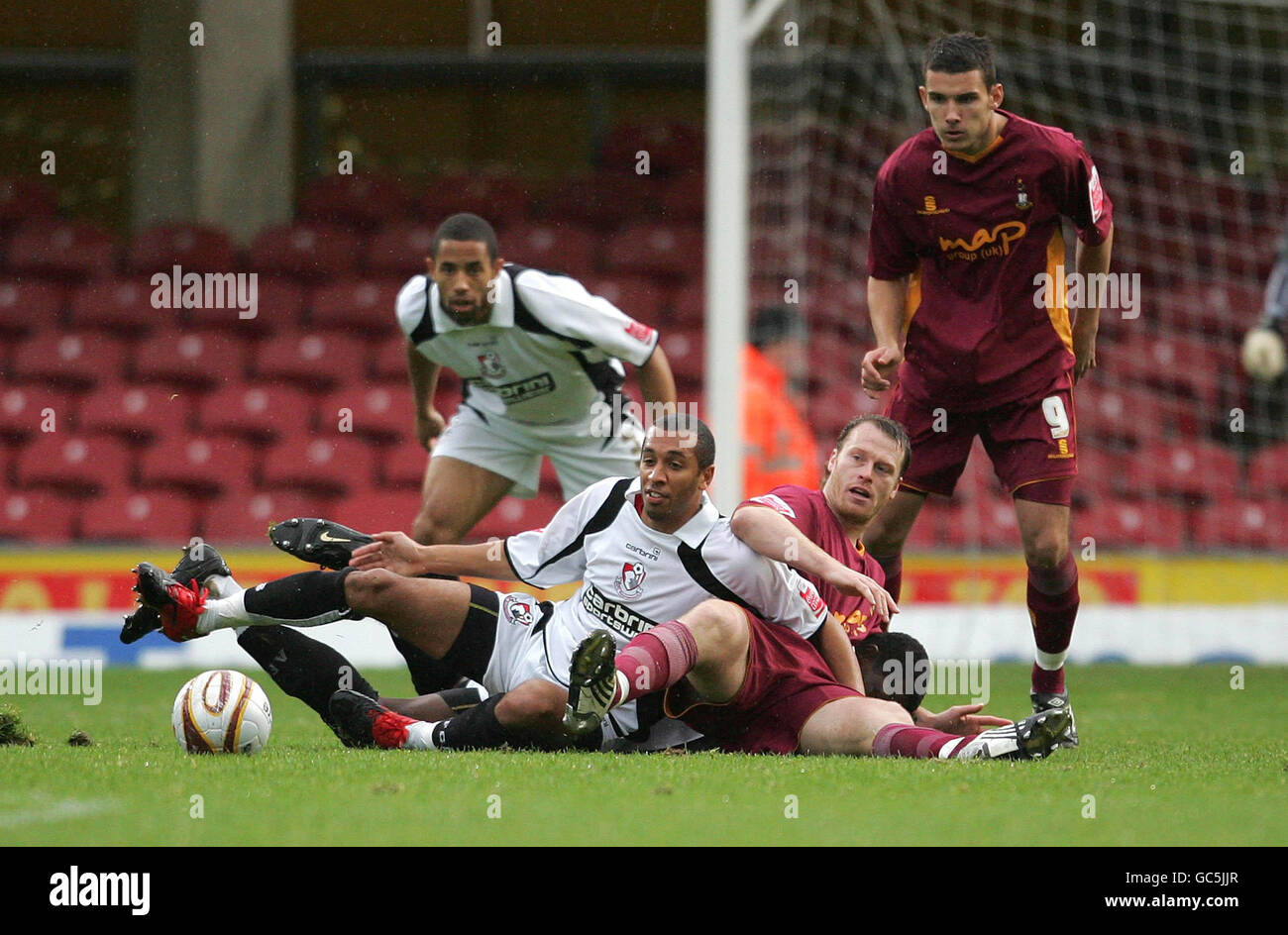 Bradford City's Lee Bullock (right) and Bournemouth's Shaun Cooper ...