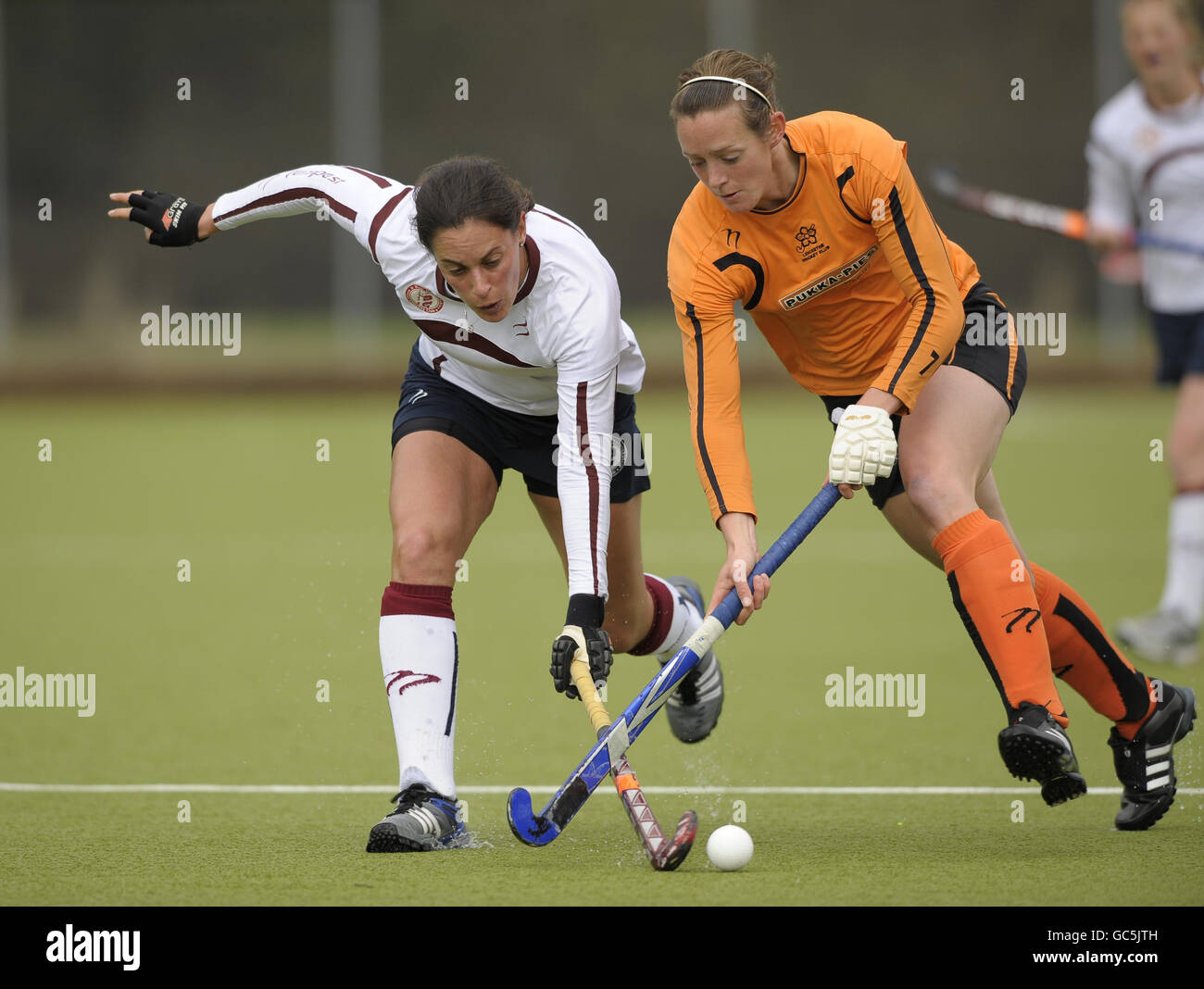 Leicester's Hannah MacLeod (right) challenges with Olton's Emma Rochlin ...