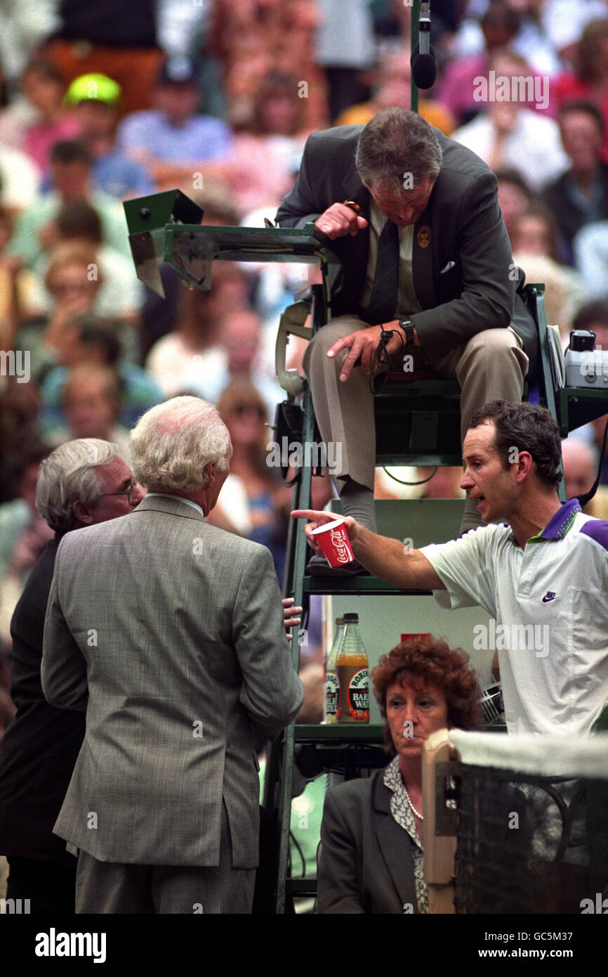 JOHN MCENROE DISCUSSES A LINE CALL WITH ASSISTANT REFEREE TONY ...