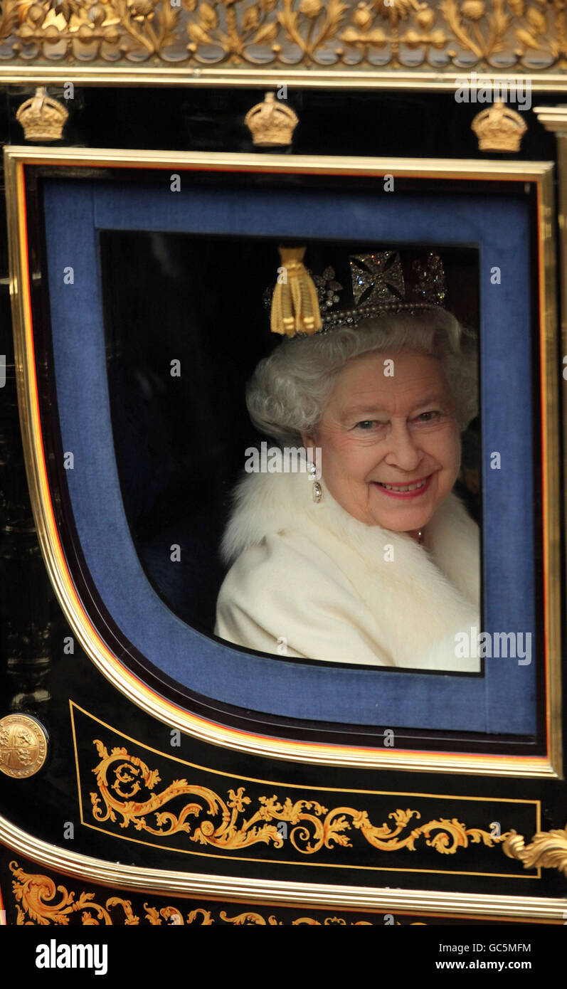 The State Coach carrying Britain's Queen Elizabeth II and the Duke of ...