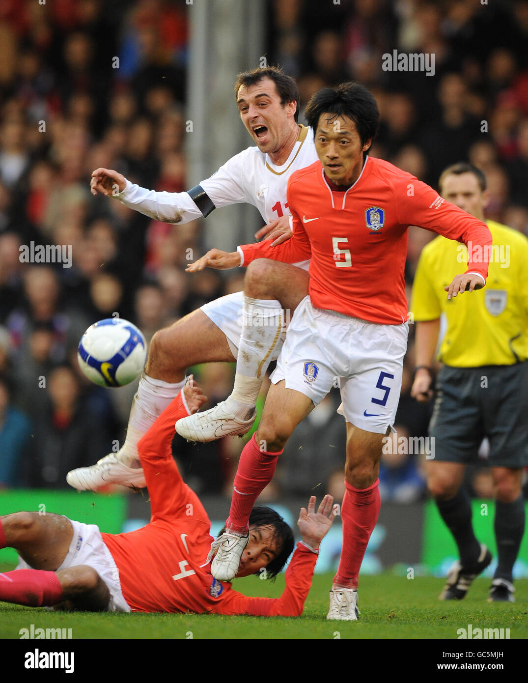 South Korea's Cho Yong Hyung (4) and Kim Nam IL and Serbia's Nenad ...