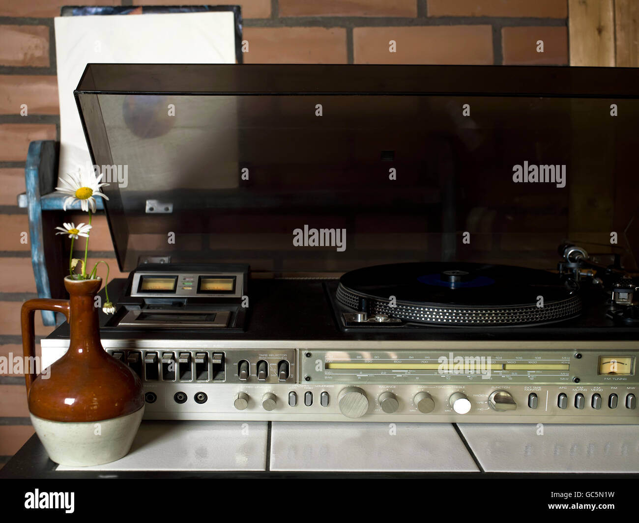 Front interior shot of a retro home stereo center against the wall ...