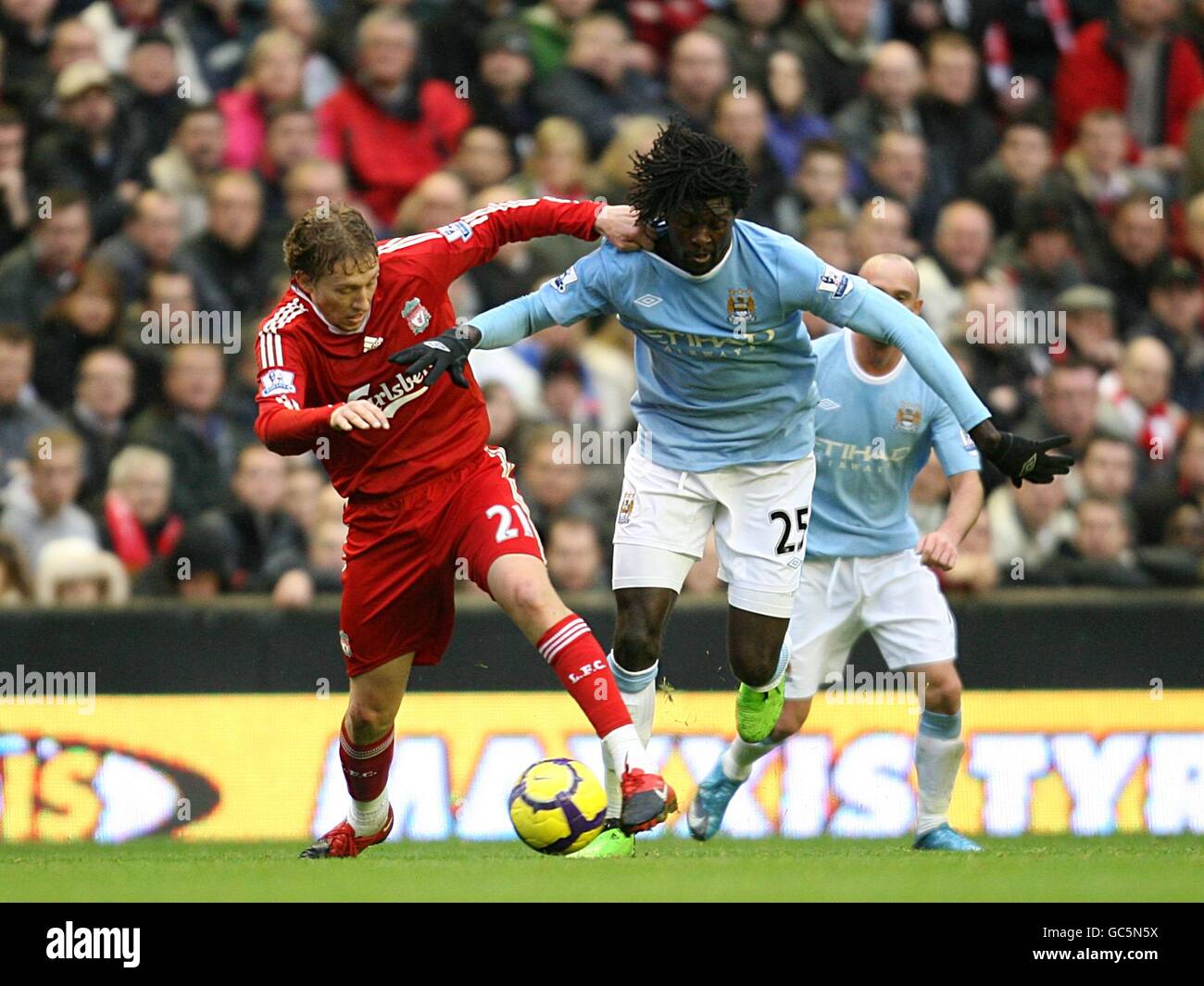 Manchester City's Emmanuel Adebayor (right) and Liverpool's Leiva Lucas ...