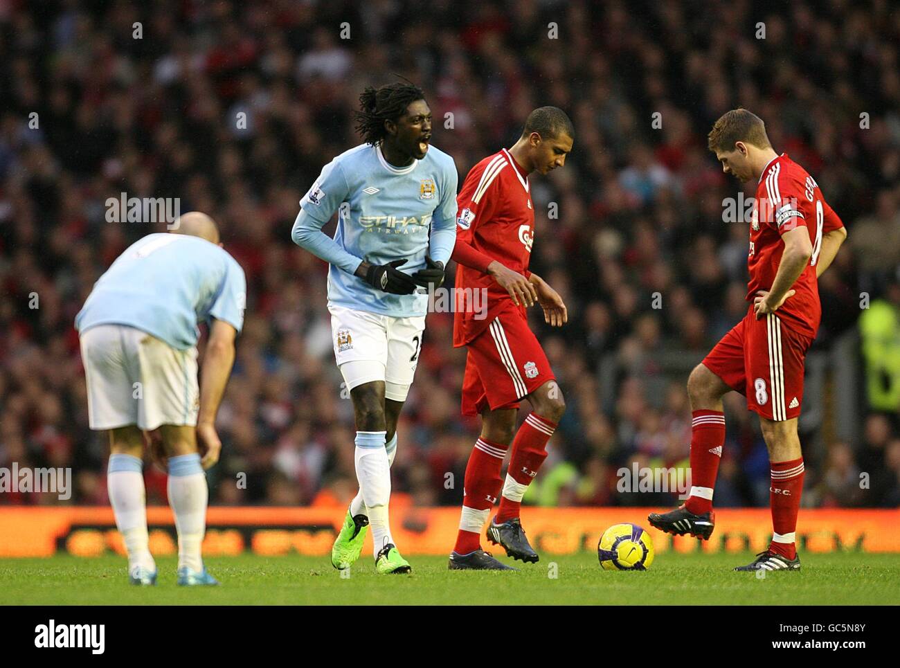 Manchester City's Emmanuel Adebayor (left) celebrates scoring his sides ...