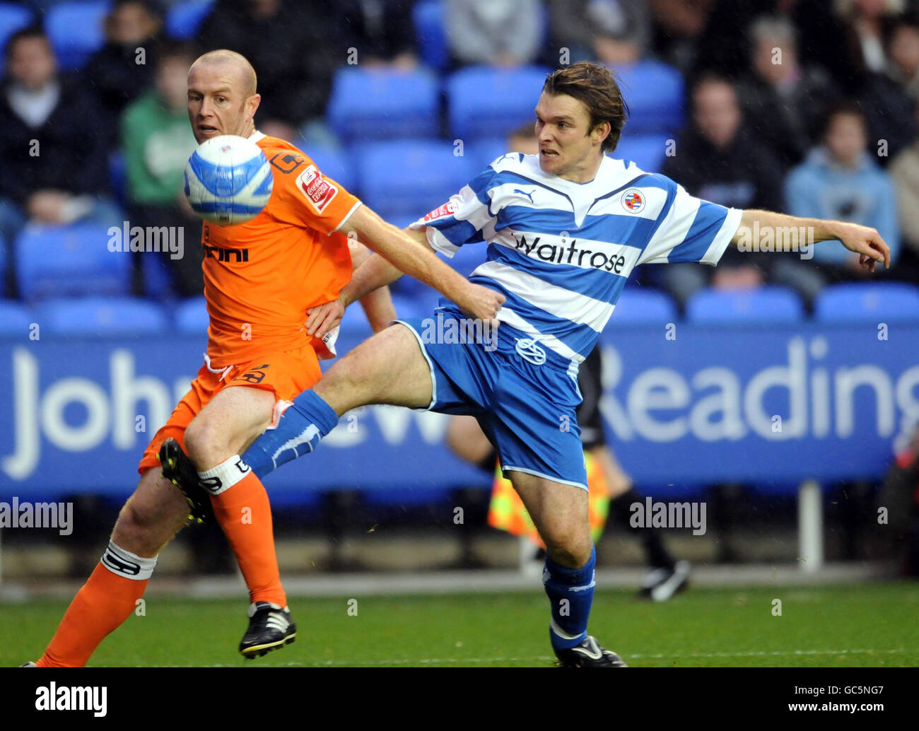 Reading's Jay Tabb (right) and Blackpool's Stephen Crainey battle for ...