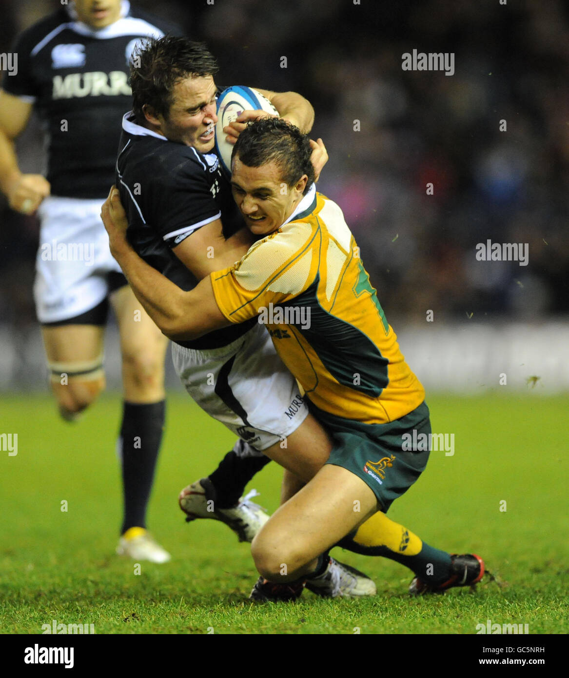 Scotland's Alex Grove and Australia's Quade Cooper during the 2009 Bank ...
