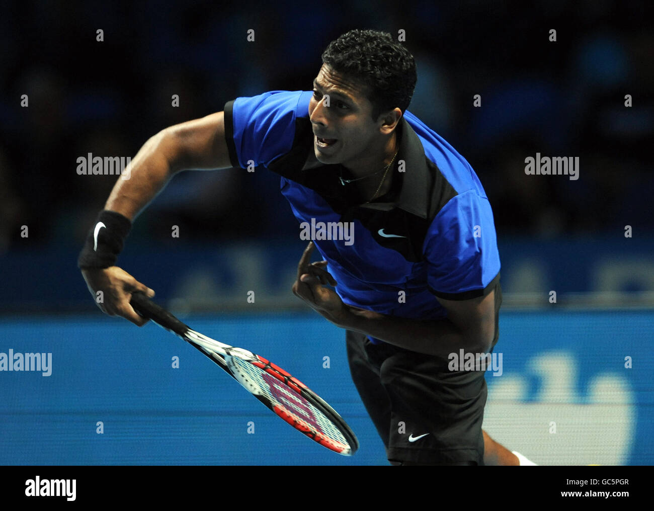 India's Mahesh Bhupathi (pictured) and Mark Knowles of Bahamas play ...