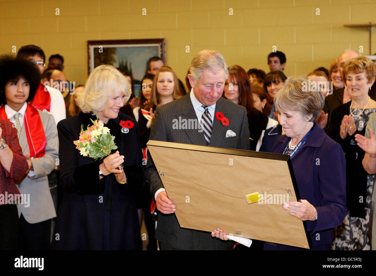 The Prince of Wales and the Duchess of Cornwall present a long service ...