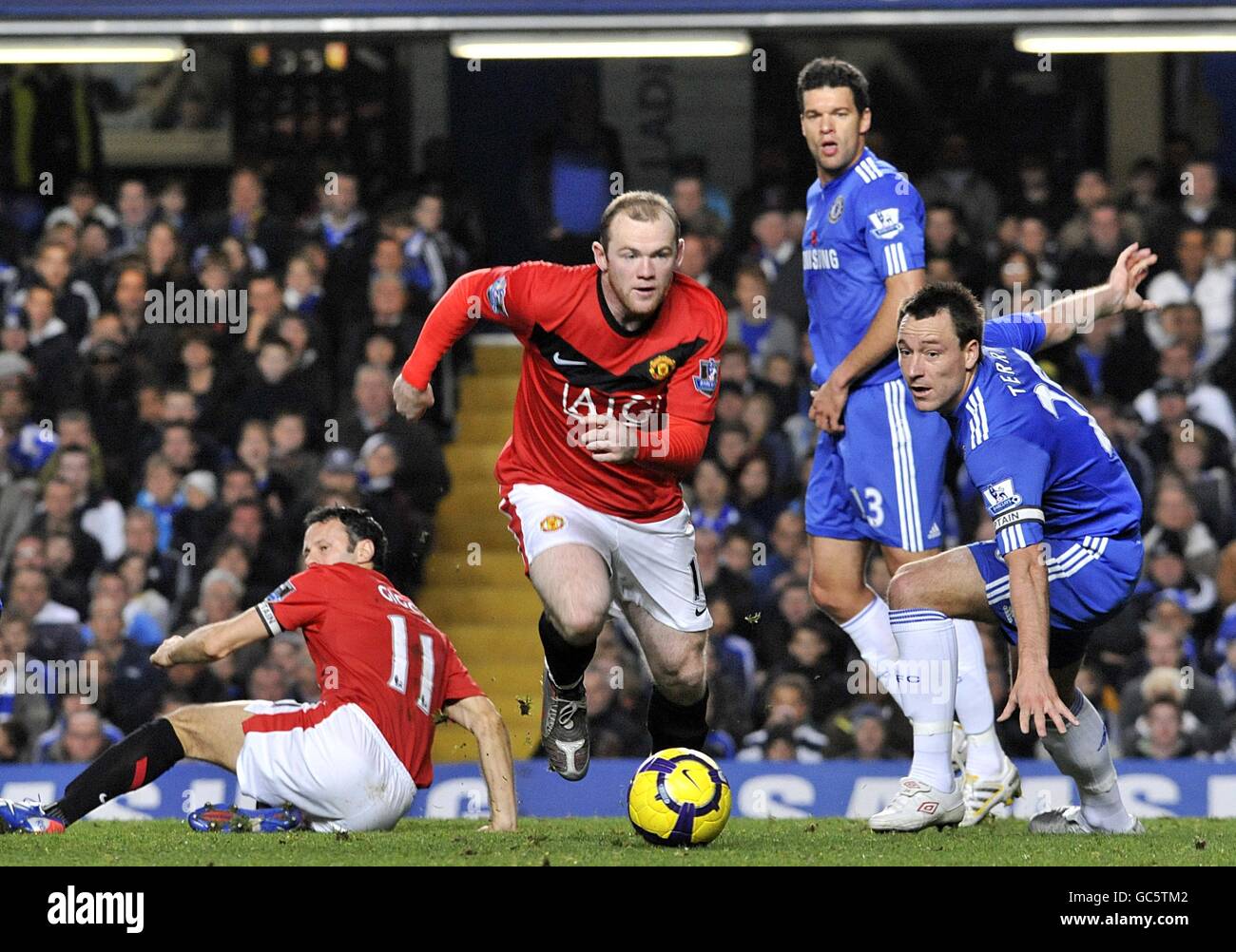 Manchester United's Wayne Rooney (center) and Chelsea's John Terry ...