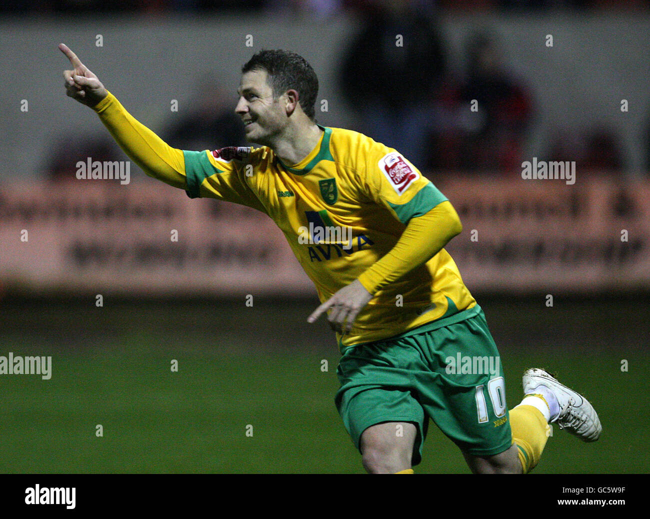 Norwich City's Jamie Cureton celebrates scoring the winning penalty of ...