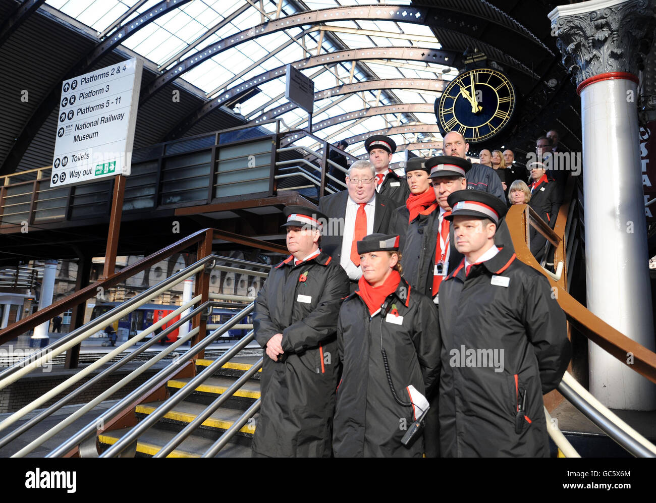 National Express Staff and passengers at York railway station, observe ...