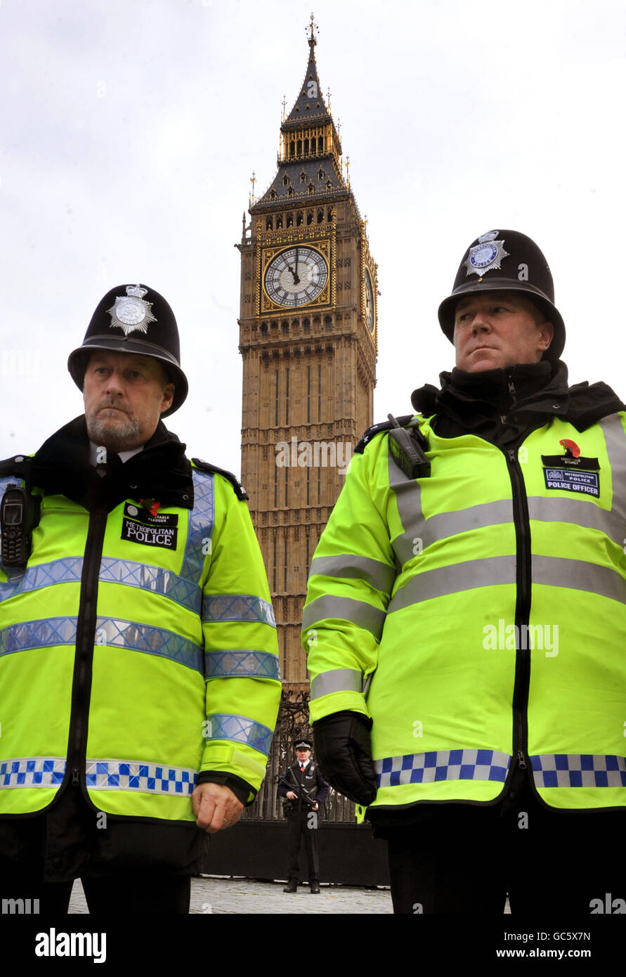 Police officers at the Houses of Parliament observe a two minute ...