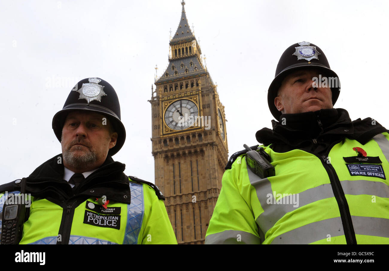 Police officers at the Houses of Parliament observe a two minute ...