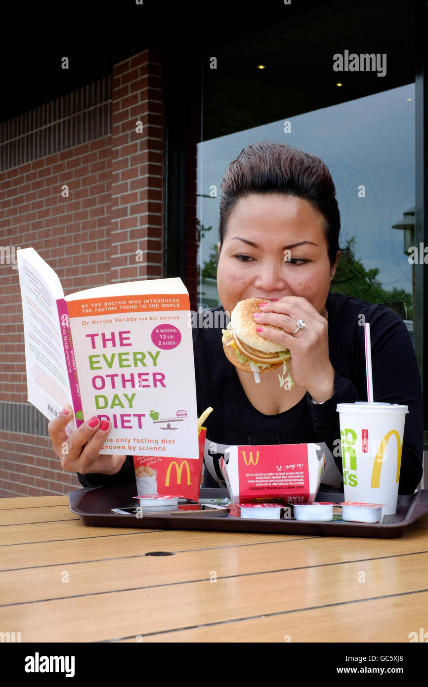 Female reading large book hi-res stock photography and images - Alamy