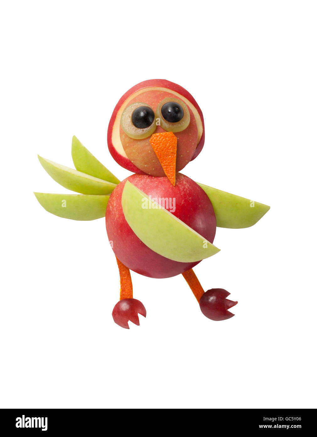 Amusing bird made of apple on white background Stock Photo - Alamy
