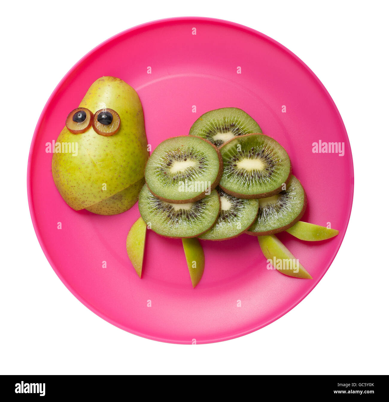 Turtle made of kiwi and pear on plate Stock Photo - Alamy