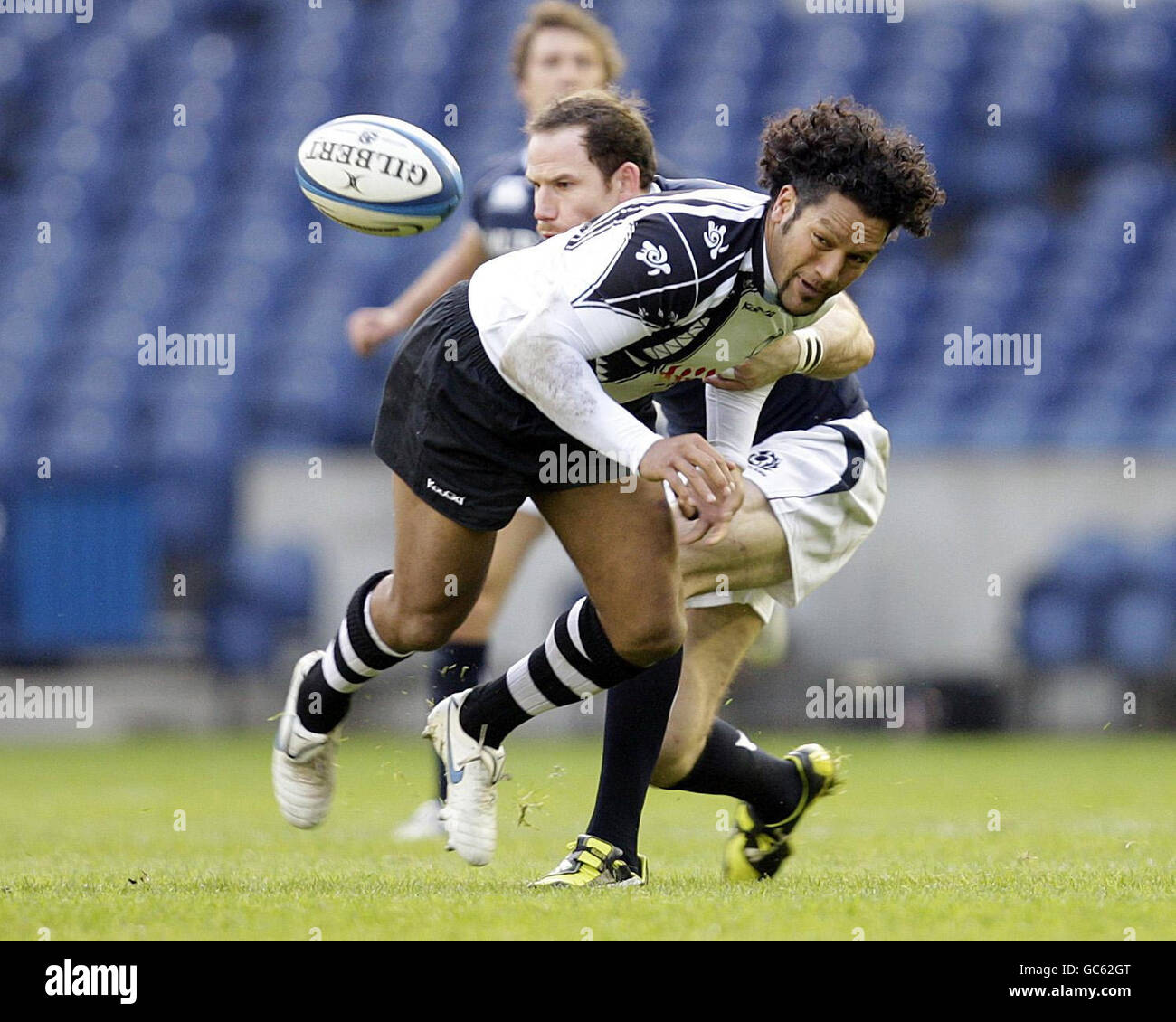 Scotland's Graeme Morrison (back) tackles Fiji's Nicky Little during ...