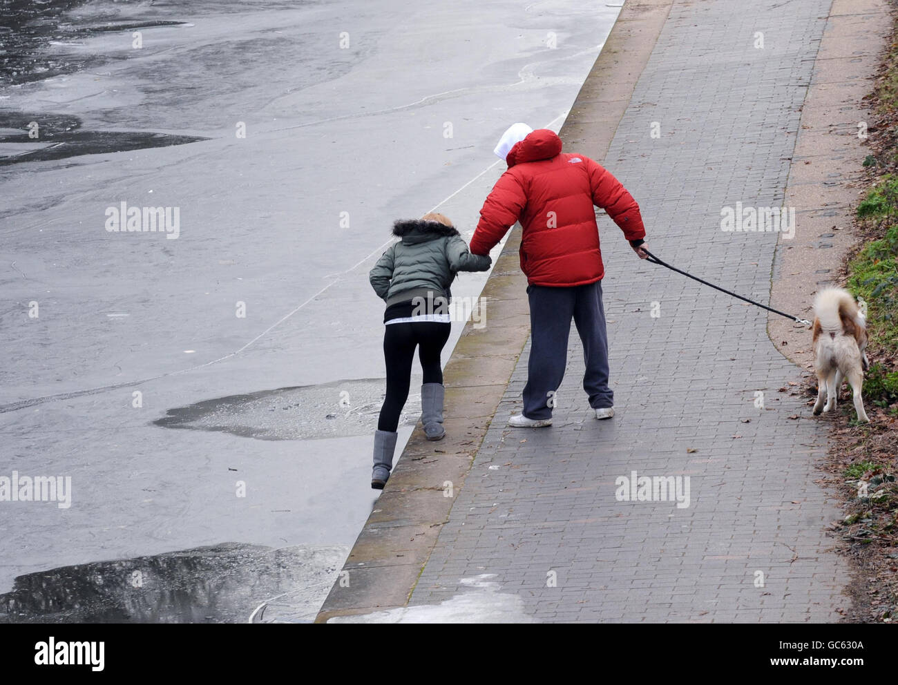 Woman checking weather temperature hi-res stock photography and images ...