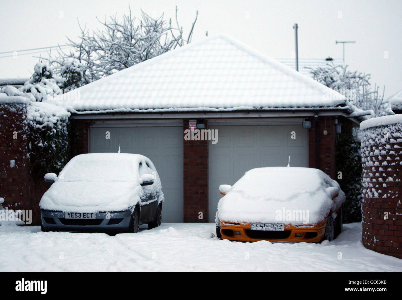 Snow covers cars in the village of Norton, near Worcester, following ...