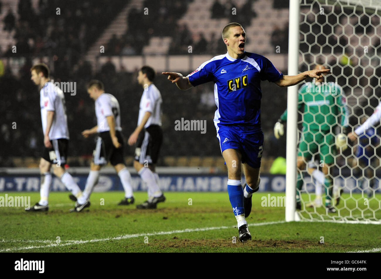 Millwall's Steve Morison (2nd right) celebrates scoring the opening ...