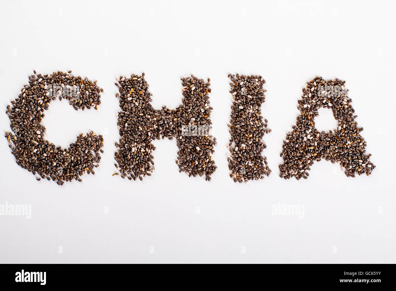 Word chia piled of chia seed on white background Stock Photo - Alamy