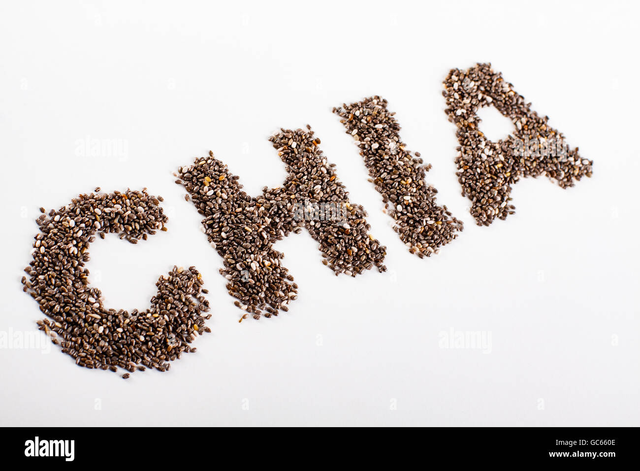 Word chia piled of chia seed on white background Stock Photo - Alamy