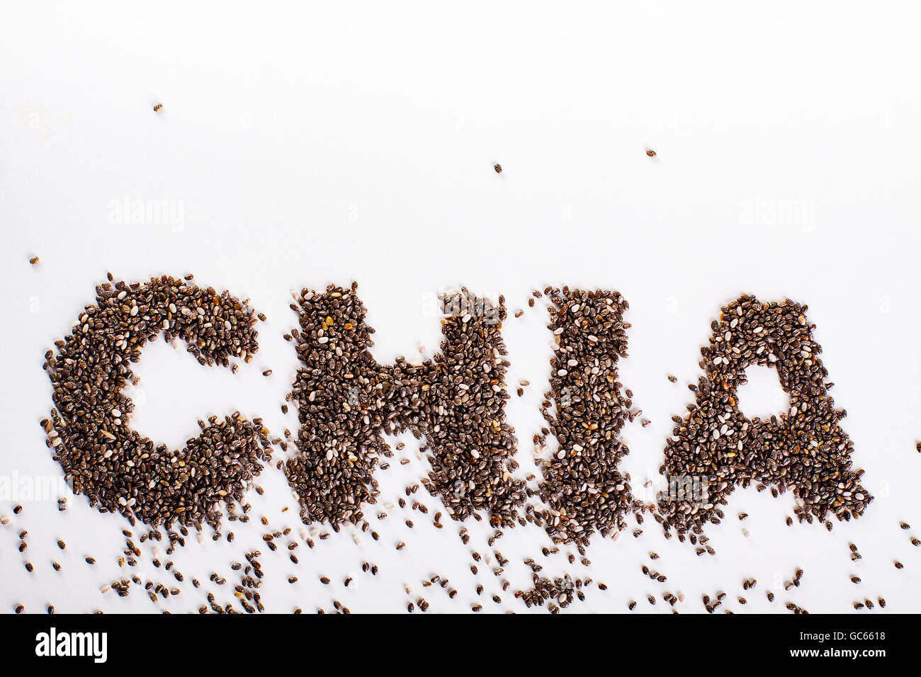 Word chia piled of chia seed on white background Stock Photo - Alamy