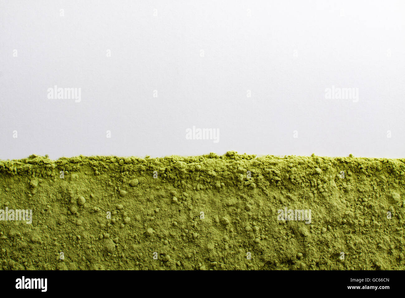 Green background powder hi-res stock photography and images - Alamy