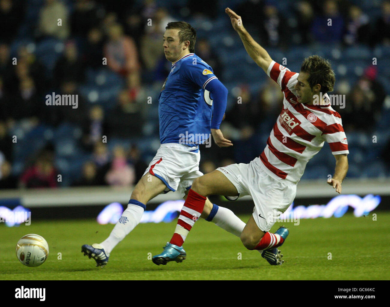 Rangers' Danny Wilson and Hamilton's Mario Paixao (right) battle for ...